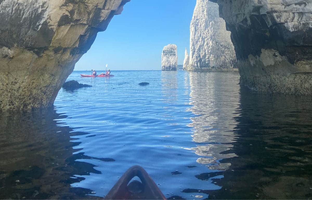 11 Dorset Kayaking Spots For Sea Stacks, Coves, and Views